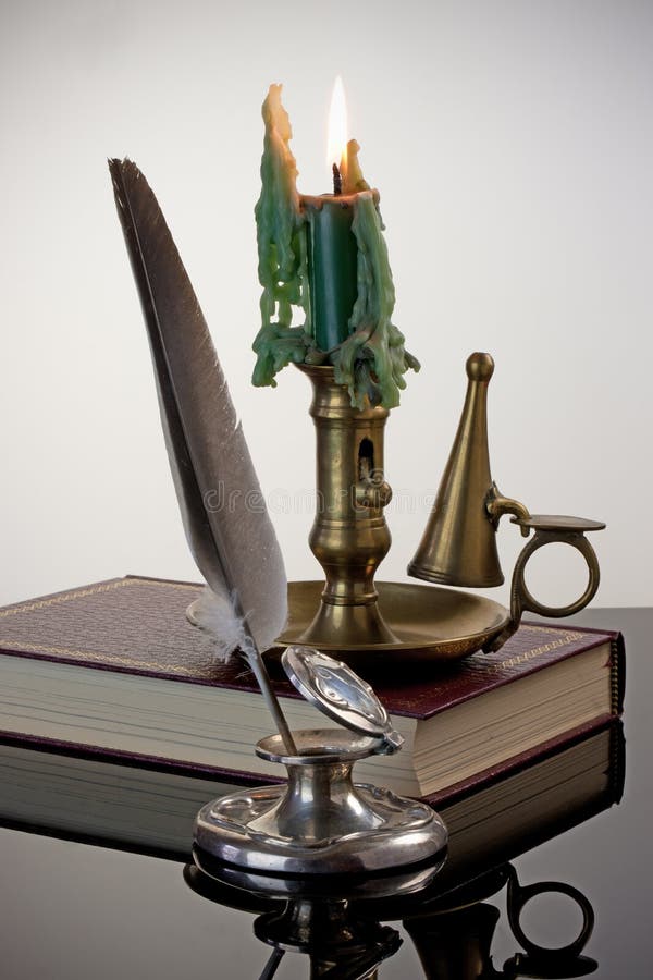 Quill Pen and Candlestick stock image. Image of fire - 27182845