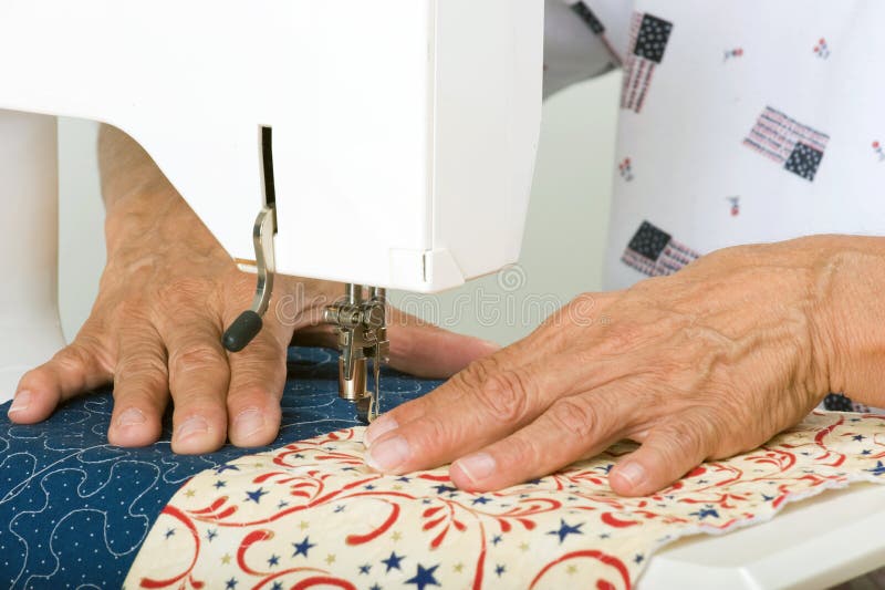 Quilter machine quilting. stock photo. Image of sewing - 15016742
