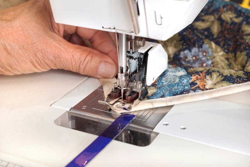 Quilter Sewing on Binding To Quilt. Stock Image - Image of color, work ...