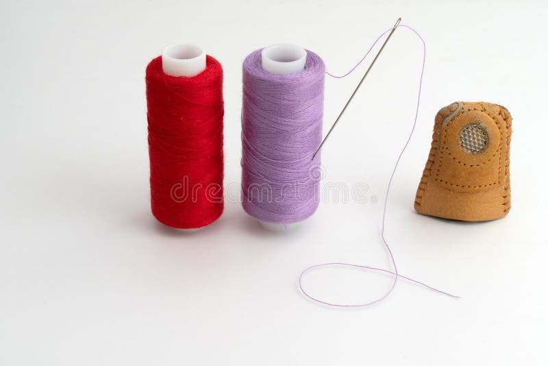 Quilting Essentials: Sewing Thread, Needle and Leather Thimble Stock ...