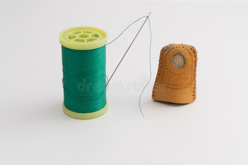 Quilting Essentials: Quilting Thread, Needle and Leather Thimble Stock ...