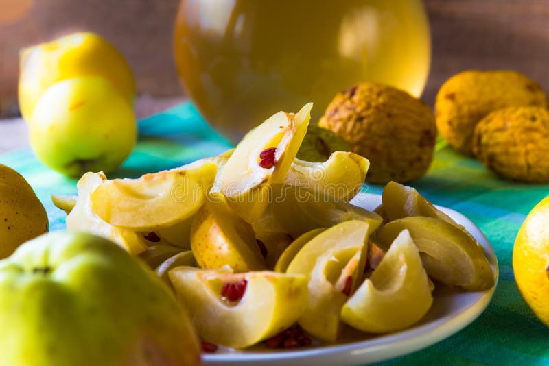 Quince Sliced Fruit Wooden Table Setting Stock Photo - Image of liqueur ...