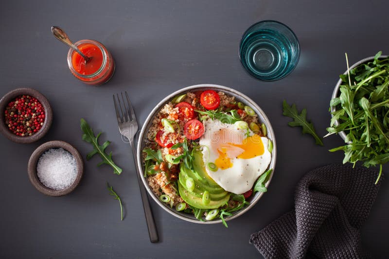 Quinoa Bowl with Fried Egg, Avocado, Tomato, Rocket. Healthy Vegetarian ...