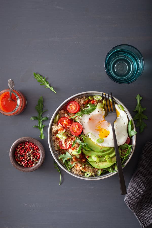Quinoa Bowl with Fried Egg, Avocado, Tomato, Rocket. Healthy Vegetarian ...