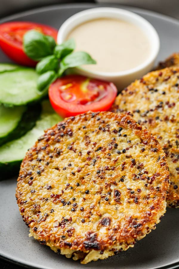 Quinoa Cutlet with Vegetables on a Black Wooden Rustic Background Stock ...