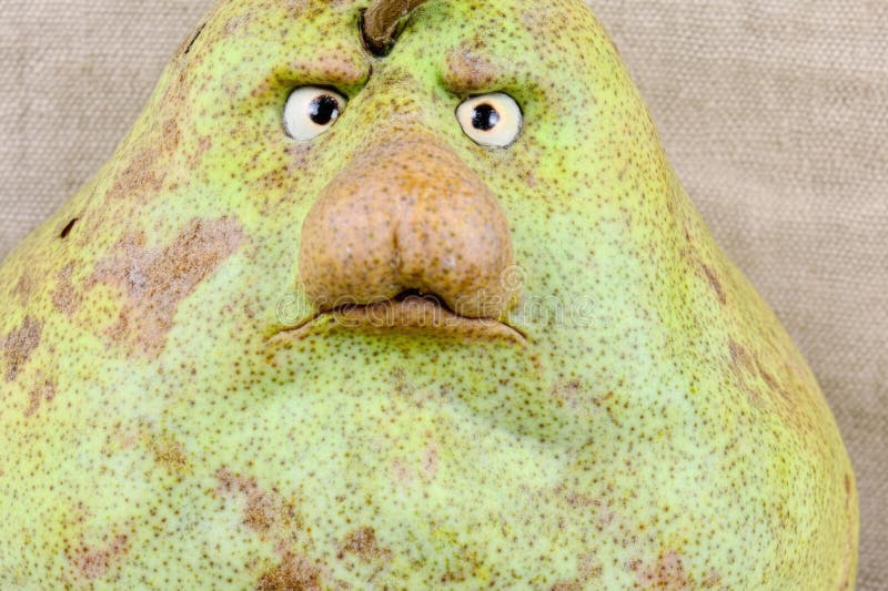 Quirky Facial Expression on Spotted Pear with Human Features Stock ...