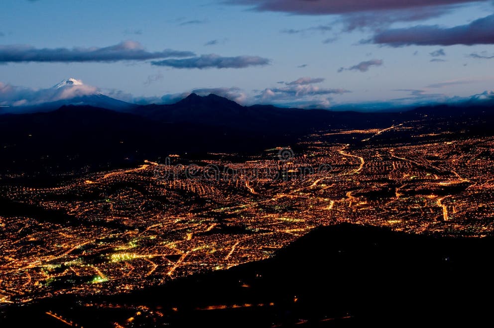 Quito at Night with Cotopaxi Mountain Stock Photo - Image of commercial ...