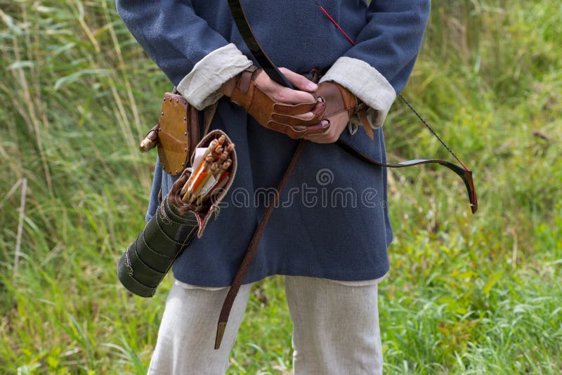 Quiver and Arrows Bow in Hand Stock Image - Image of nature, hobby ...