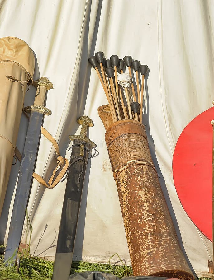 A Quiver of Arrows and Swords Stock Photo - Image of knife, historical ...