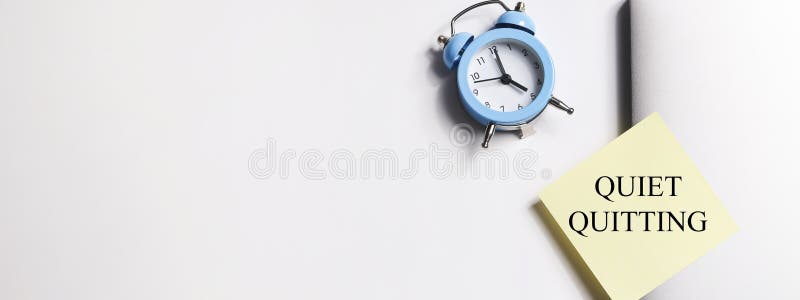Quote Quiet Quitting on Yellow Sticker on Computer with Clock Stock ...