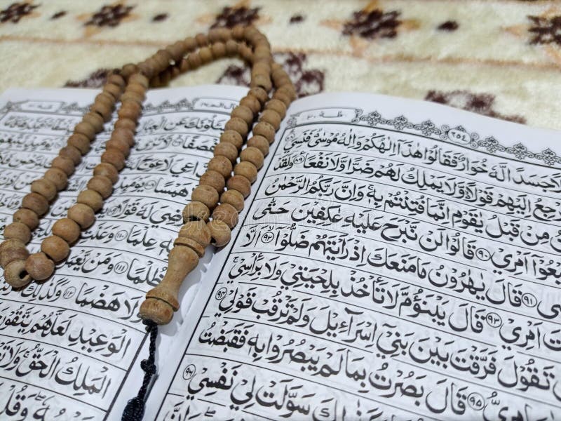 Quran and Tasbih/misbaha or Islamic Prayer Beads on Rihal Stock Image ...