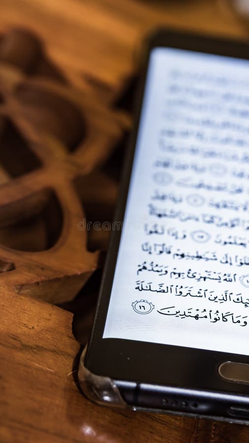 Quran in Smart Phone Apps on Wooden Book Stand Editorial Stock Photo ...