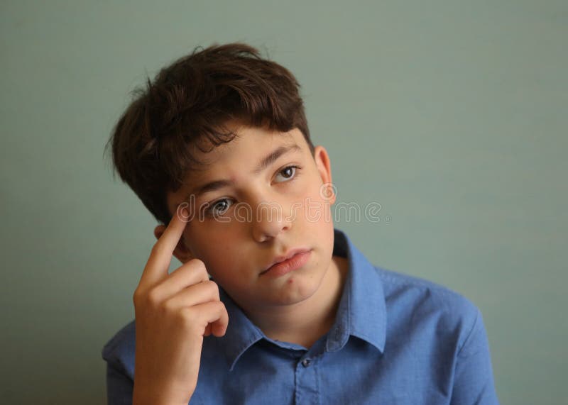 Teenager Boy Close Up Thinking Photo on Blue Background Foto de archivo ...