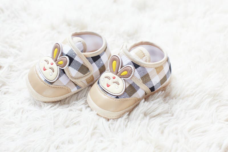 Rabbit baby shoes stock image. Image of cute, childhood - 38834009