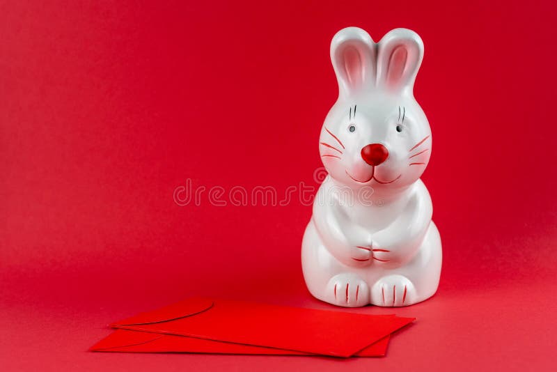 Rabbit Coin Bank and Red Envelope Year of Rabbit Concept Stock Photo ...
