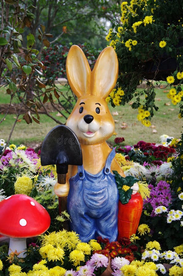 The rabbit gardener stock photo. Image of group, flora - 80553610