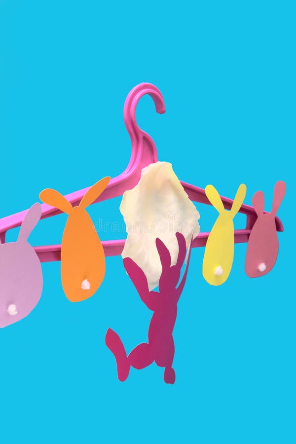 The Rabbit is Hanging from a Cabbage on a Clothes Hanger. Easter ...