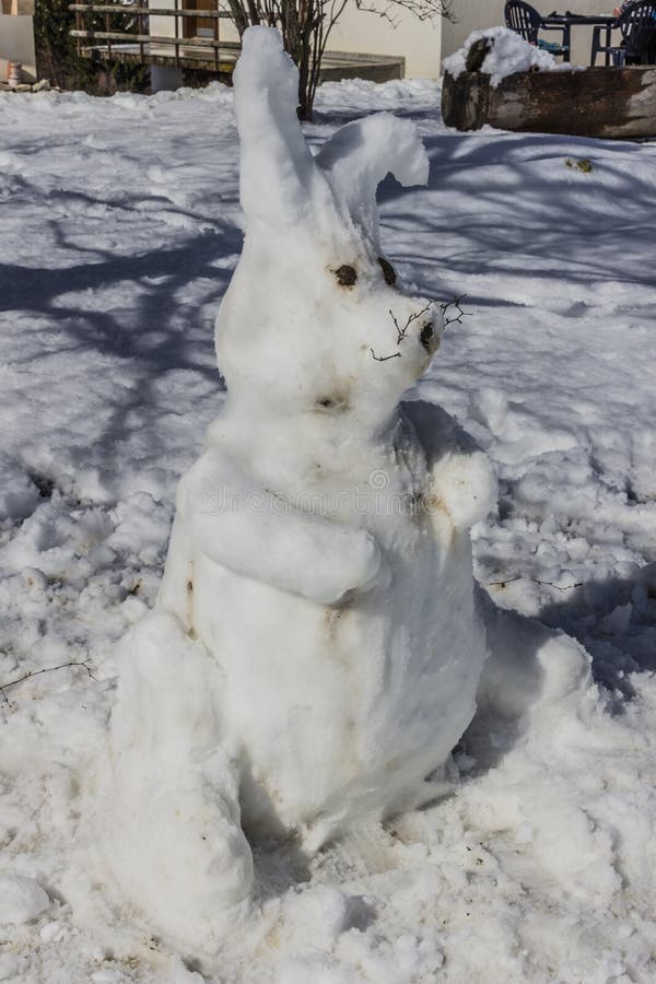 A rabbit made of snow stock photo. Image of handcraft - 164366726