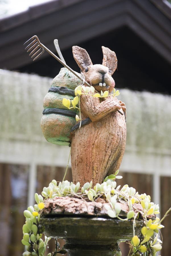 Rabbit Sculpture in the Garden Stock Image - Image of stand, decor ...