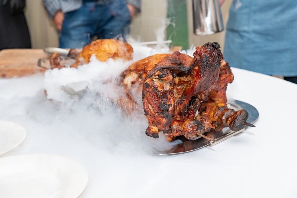 Rabbit on a Spit on the Grill Roasts Stock Photo - Image of celebration ...