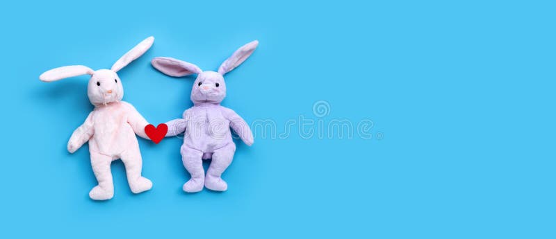 Rabbit Toy Couple on Blue Background Stock Photo - Image of balls ...