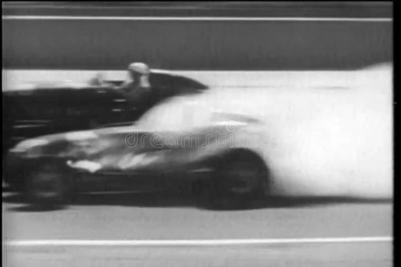 Race To the Finish Line. Vintage Race Cars Going Across the Finish Line ...