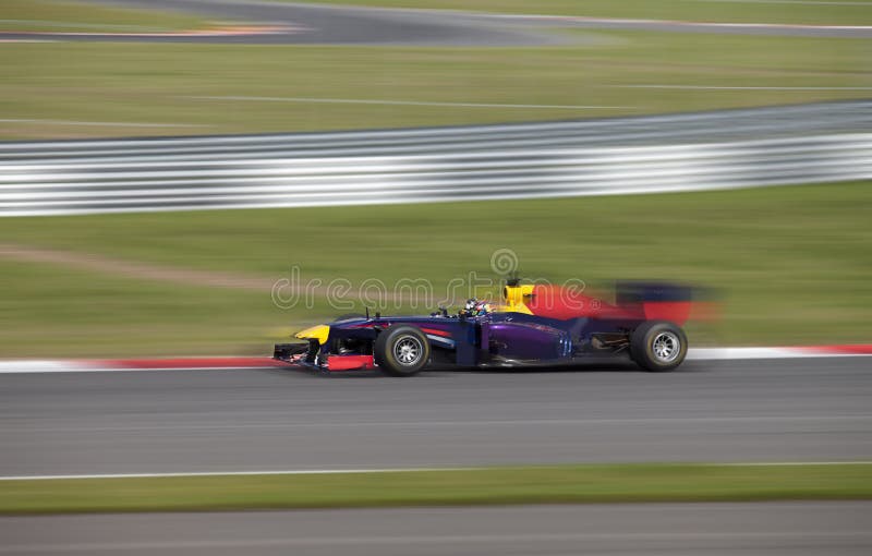 Race Car Racing at High Speed on a Racing Track Stock Image - Image of ...