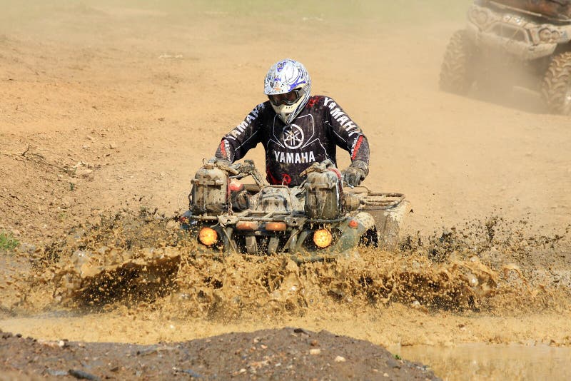 Race four-wheeler rider editorial photography. Image of sunny - 23418337