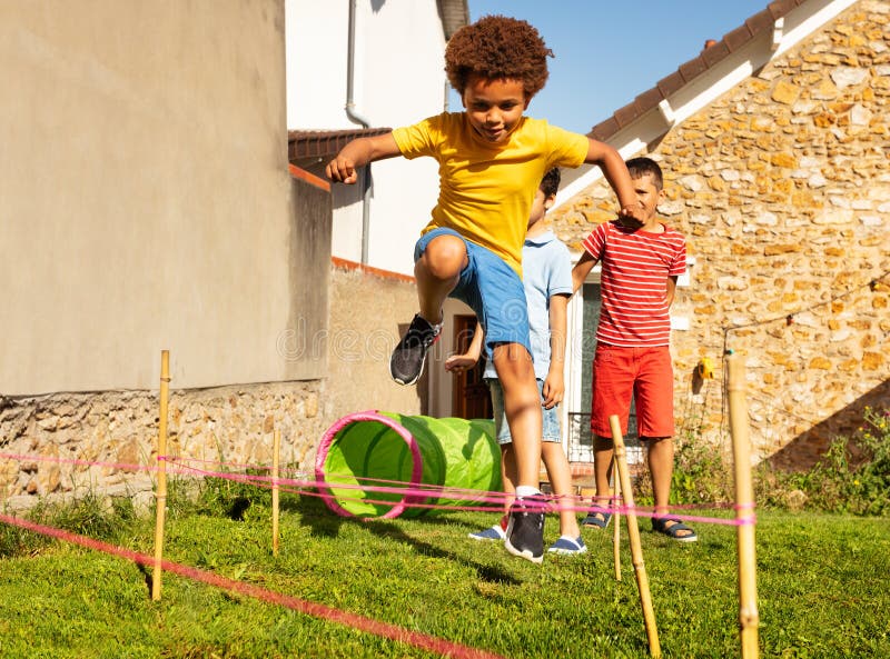 Children Jump for Ball during Basketball Game Stock Photo - Image of ...