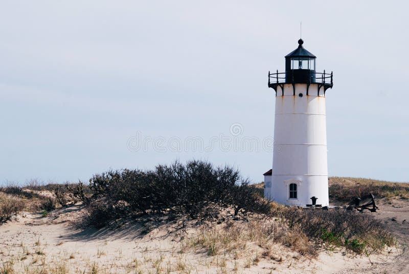 Race Point Lighthouse in Cape Cod Stock Photo - Image of meadow, house ...