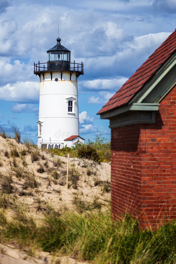 Race Point Lighthouse in Cape Cod Stock Photo - Image of meadow, house ...