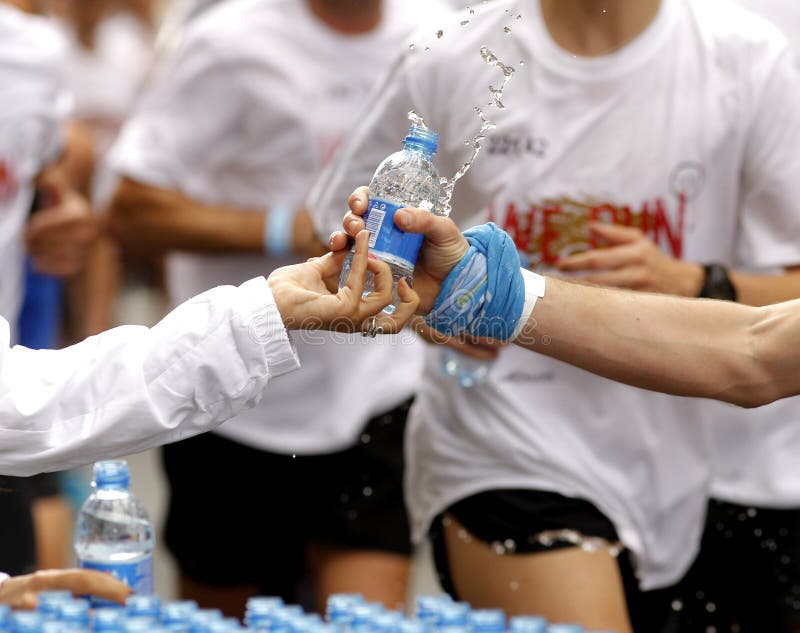 Race Refreshment editorial photography. Image of holding - 54286922