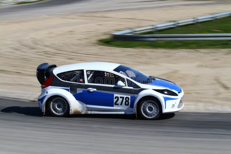 Racecar in motion stock photo. Image of rally, speed - 19464038