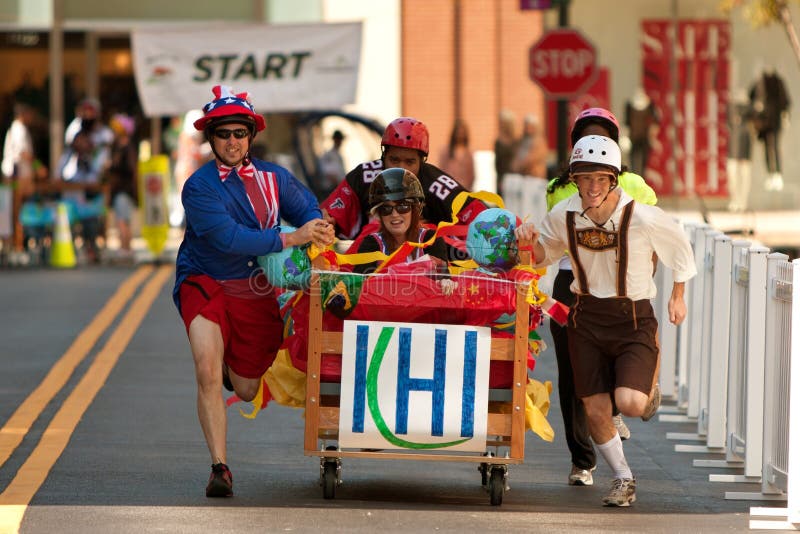 Racers Push Bed in Odd Mattress Race Editorial Photo - Image of adults ...
