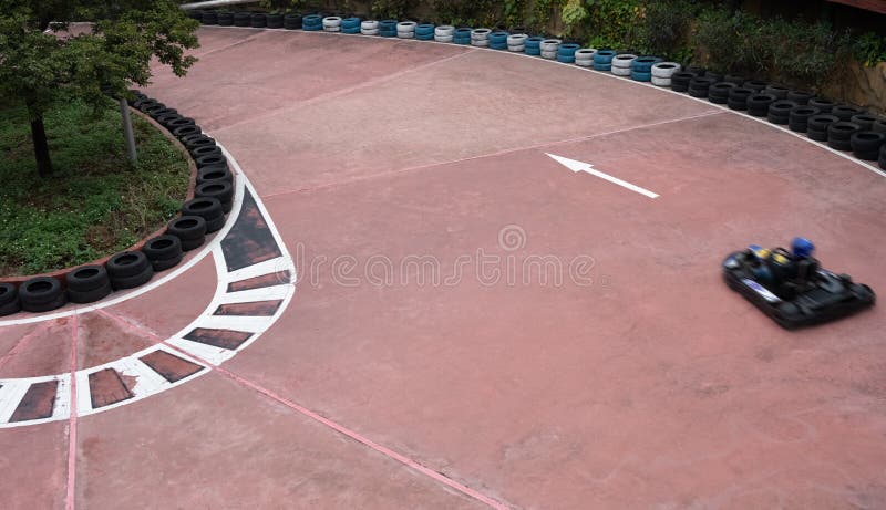 Race Track in the Outdoor with a Racecar Passing by Horizontal ...