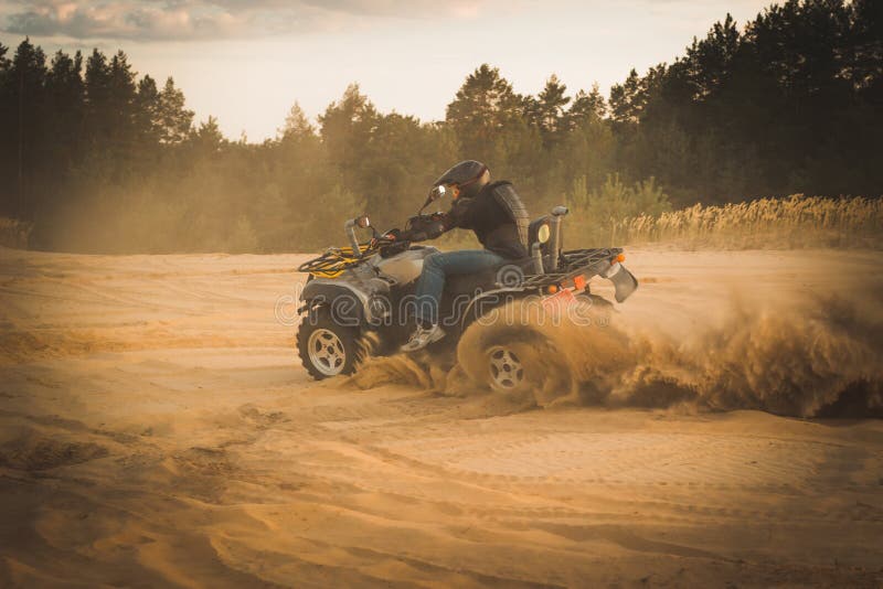 Racing ATV is sand. stock image. Image of recreation - 59493829