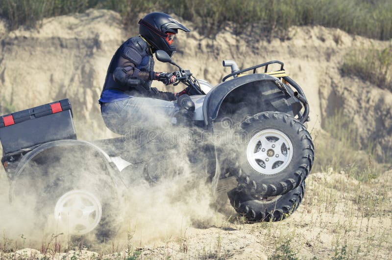 Racing atv is sand. stock image. Image of safety, contest - 77295751