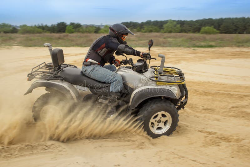 Racing ATV is sand. stock image. Image of multirace, outdoor - 71584191