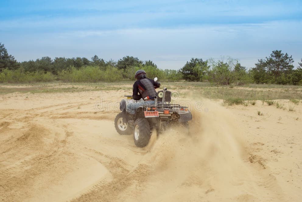 Racing ATV is sand. stock image. Image of freedom, desert - 72558143