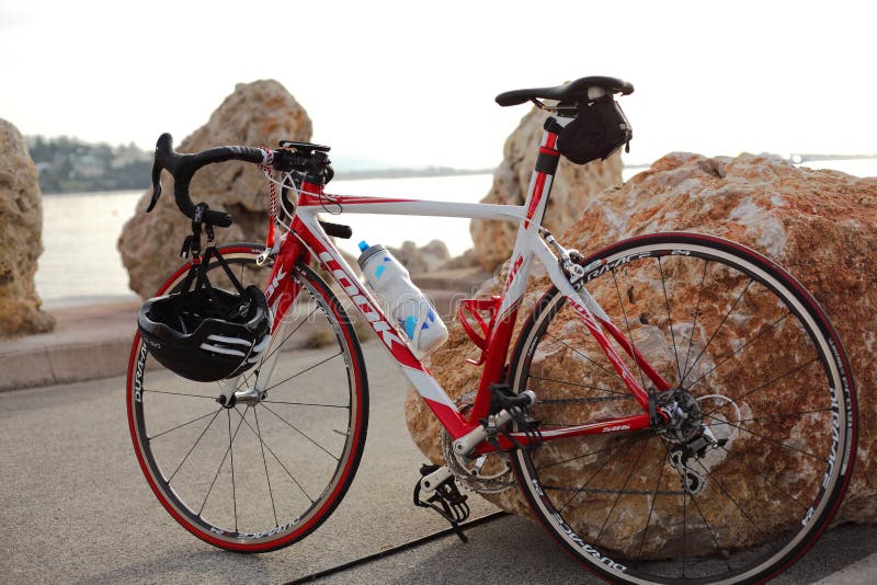 Racing Bike with Helmet editorial photography. Image of rocks - 95221707