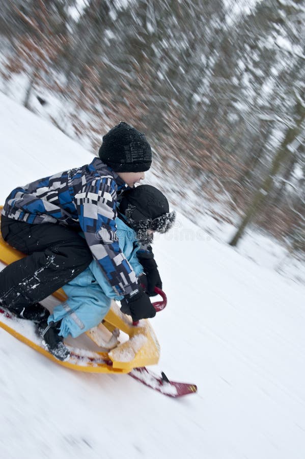 Racing Downhills on a Snow Sledge Stock Image - Image of sleigh ...