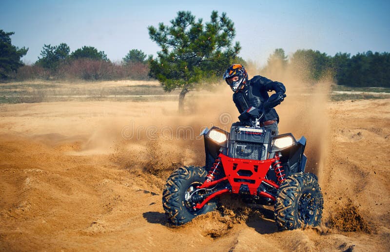 Racing ATV is sand. stock photo. Image of multirace, fighting - 59504392