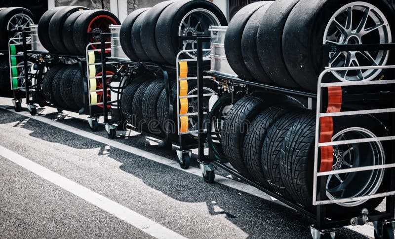 Racing Wheels on a Trolley with Air Compressed Tank - Used Tires Stock ...