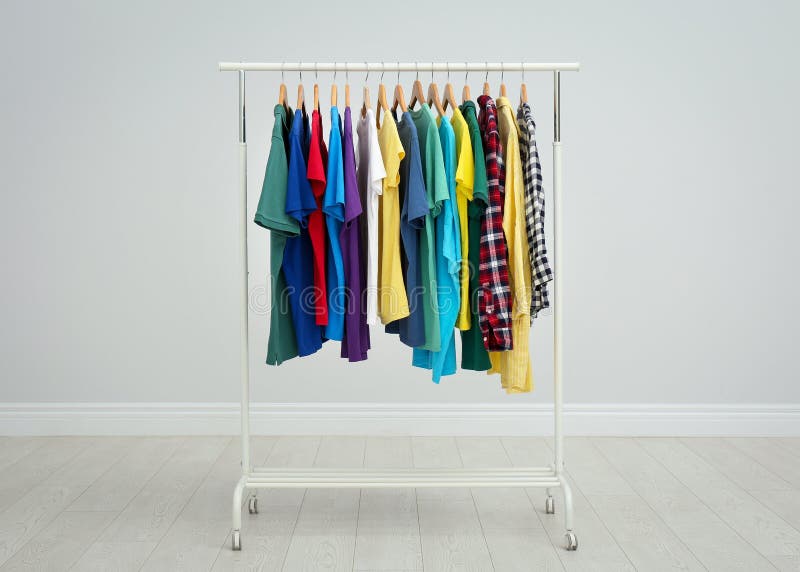 Rack with Bright Clothes on White Background Stock Image - Image of ...
