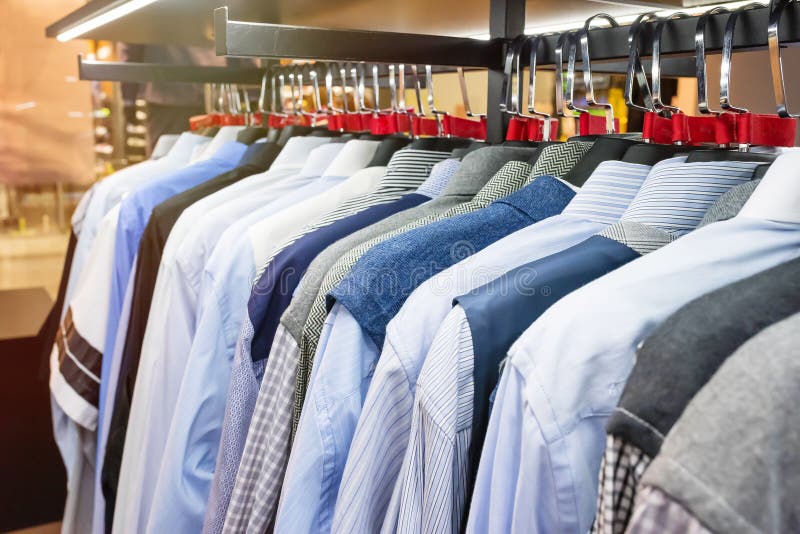 A Rack with Clothes in a Store Close-up. the Concept of Shopping Stock ...
