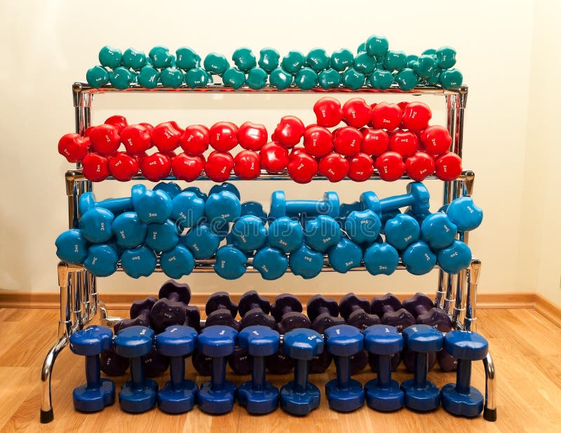 Rack with Colored Dumbbells Stock Image - Image of multicolored ...