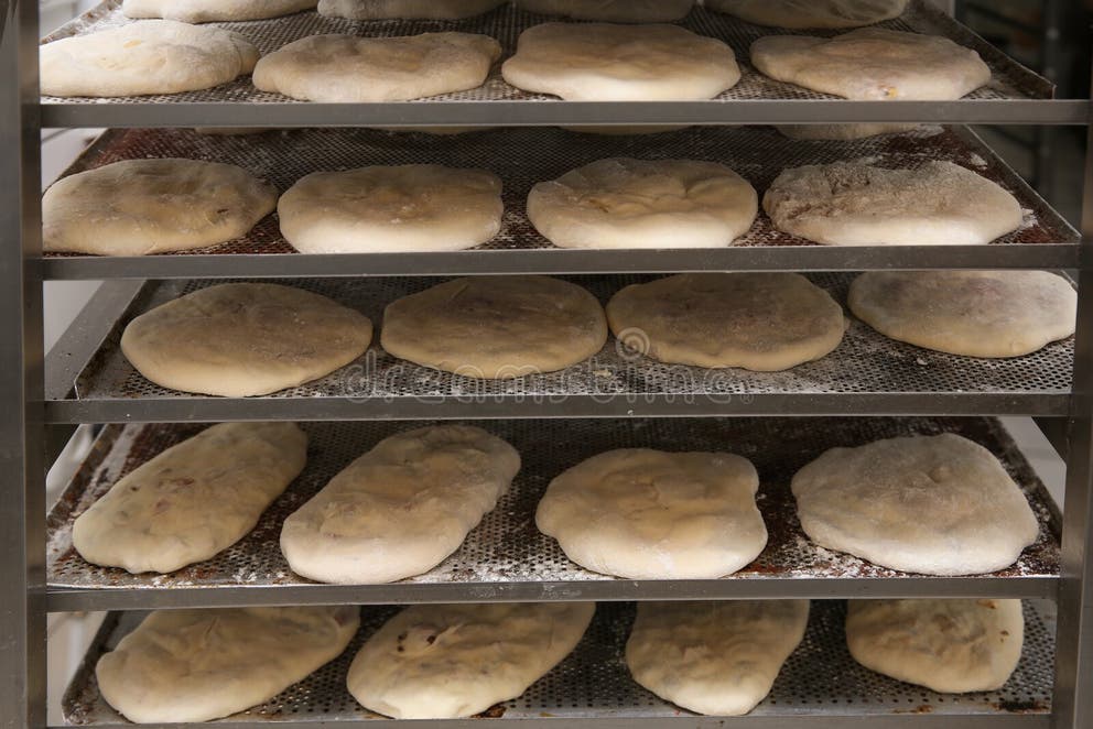 Rack with Different Unbaked Pastries Stock Image - Image of pastry ...