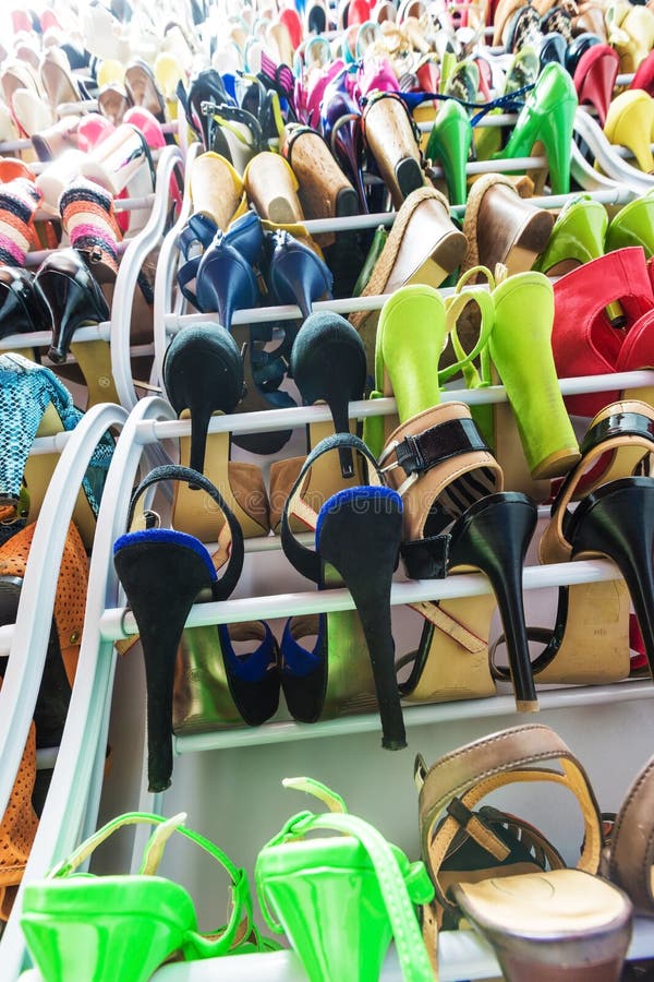 Rack with female shoes stock image. Image of heels, showcase - 56317887