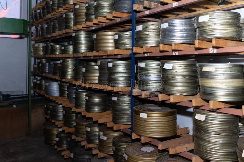 A Rack with Films in Metal Boxes Stock Image - Image of entertainment ...