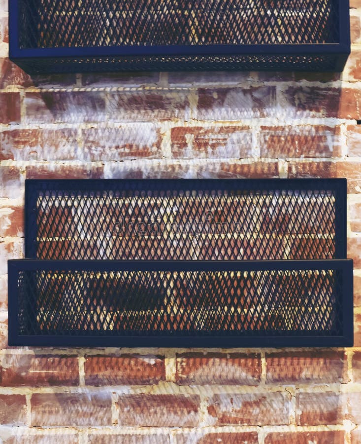 Rack Grid on a Brick Wall Background Stock Photo - Image of cement ...
